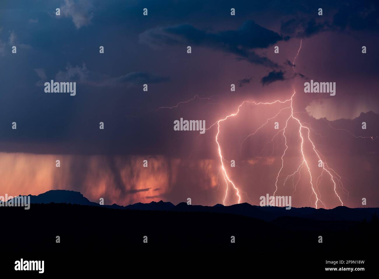 Thunderstorm lightning in the Arizona desert at sunset Stock Photo - Alamy