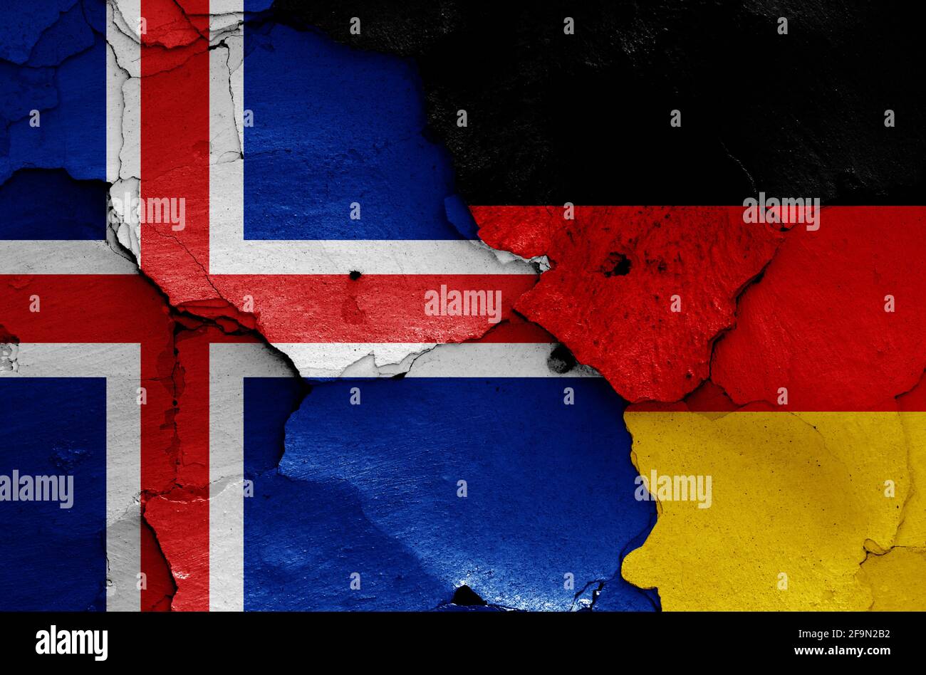 flags of Iceland and Germany painted on cracked wall Stock Photo - Alamy