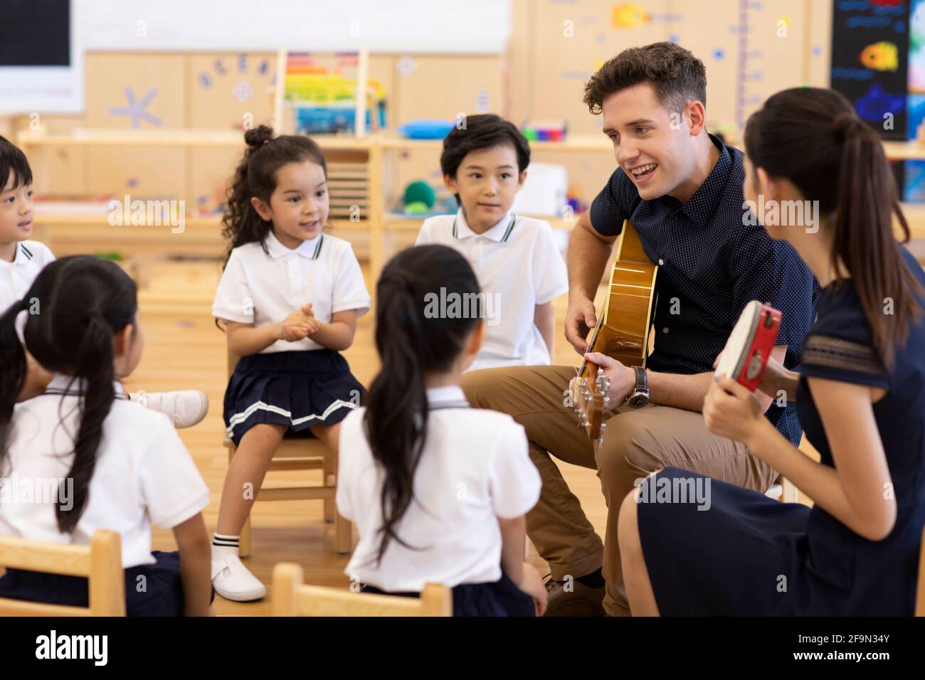 Music class in kindergarten Stock Photo - Alamy