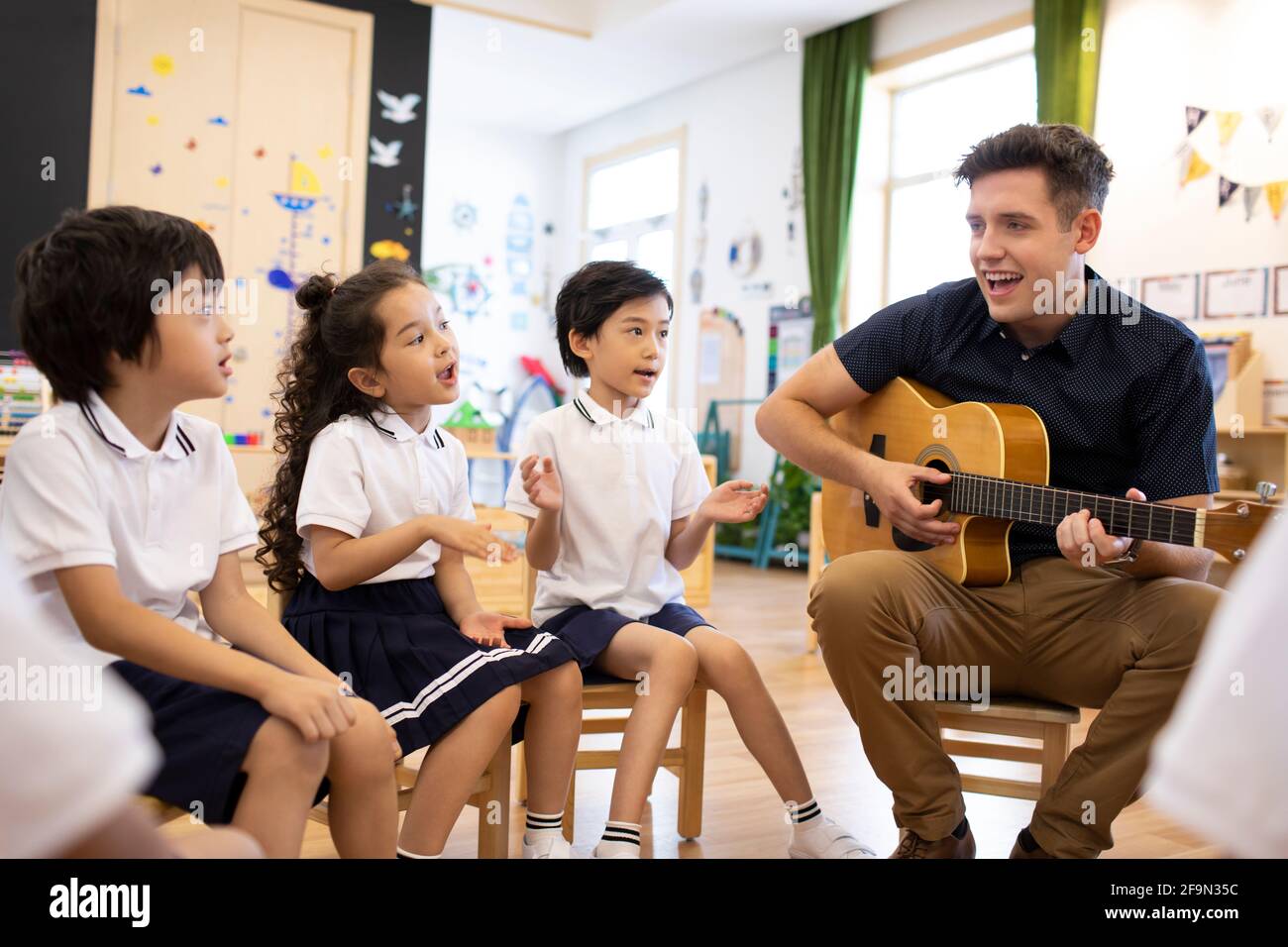 Music class in kindergarten Stock Photo - Alamy