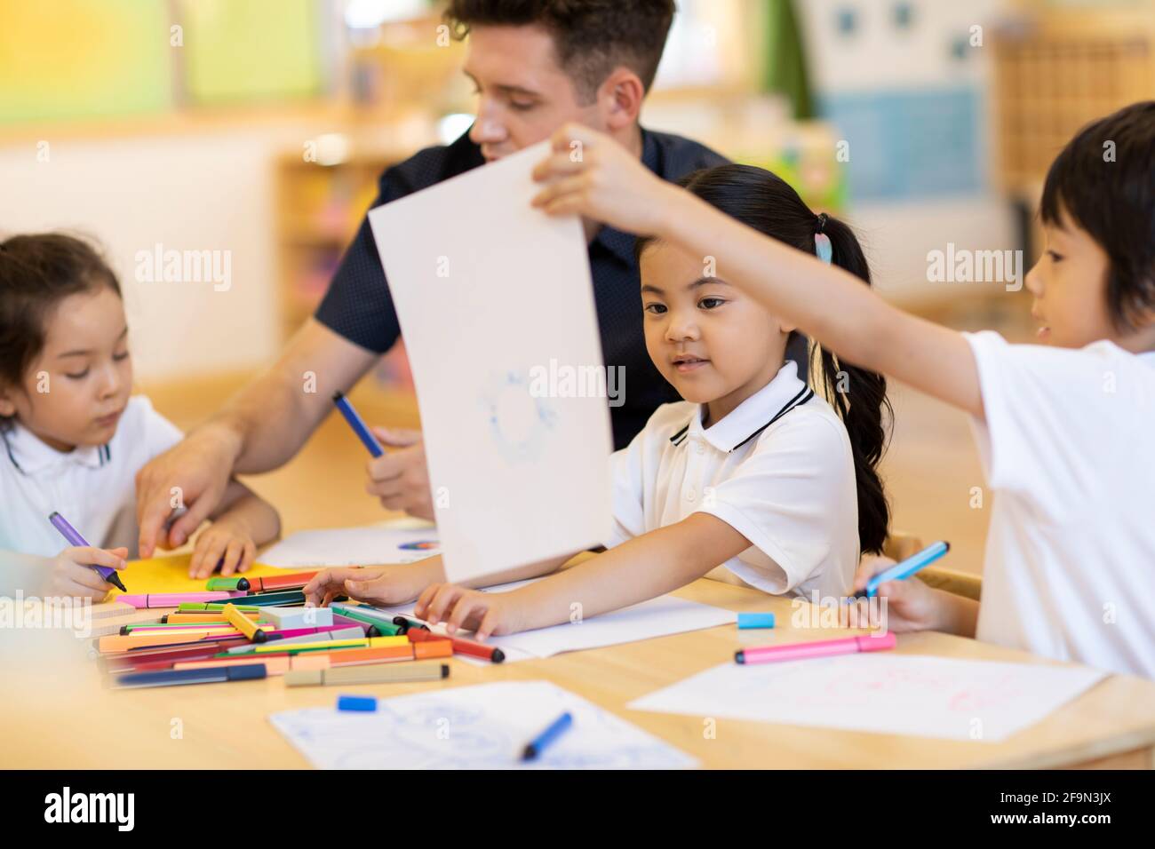 Class with foreign teacher people hi-res stock photography and images ...