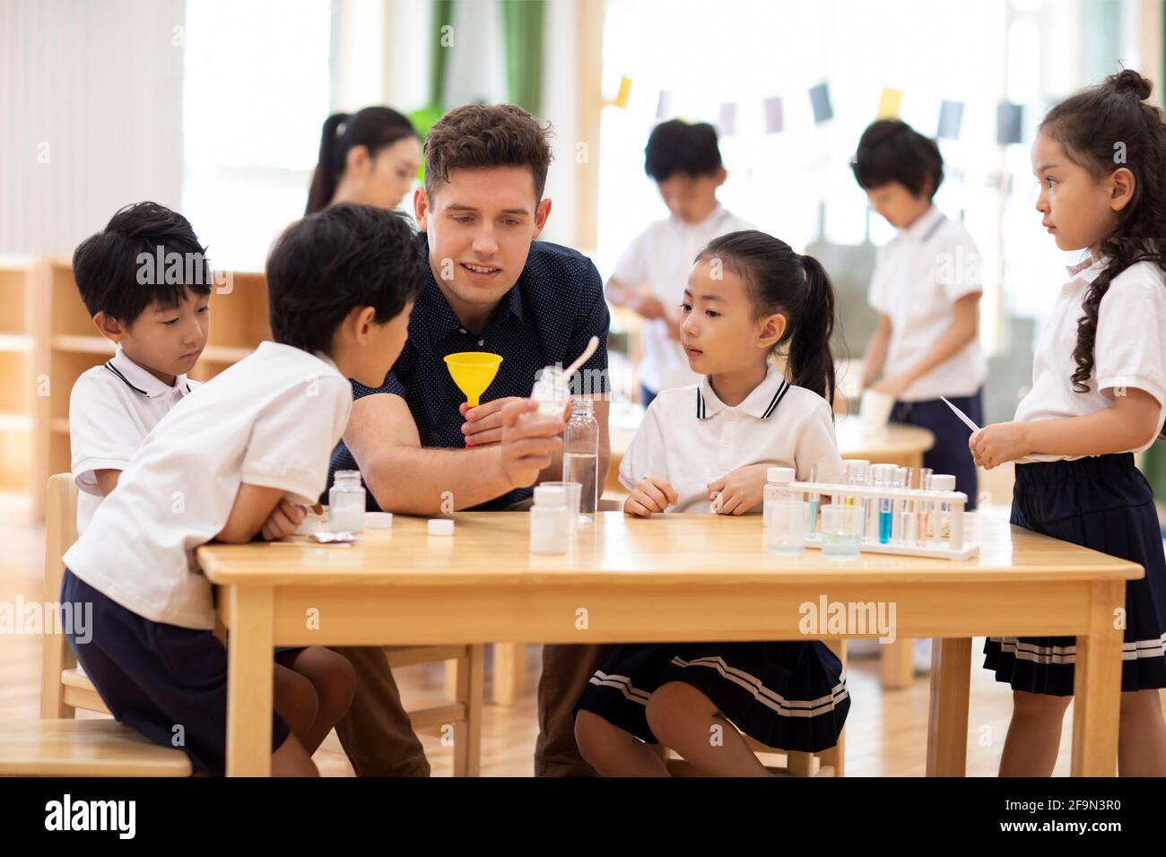 Children having science class Stock Photo - Alamy