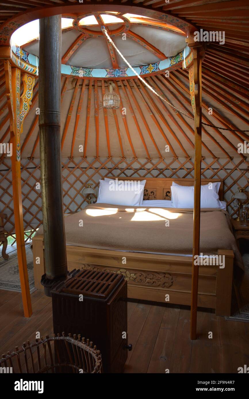 The interior of a guest ger at Three Camel Lodge, Mongolia. The rooms ...