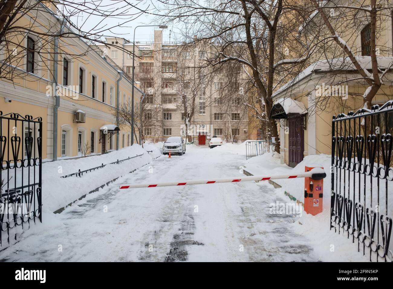 The entrance to the courtyard is closed by a barrier Stock Photo - Alamy