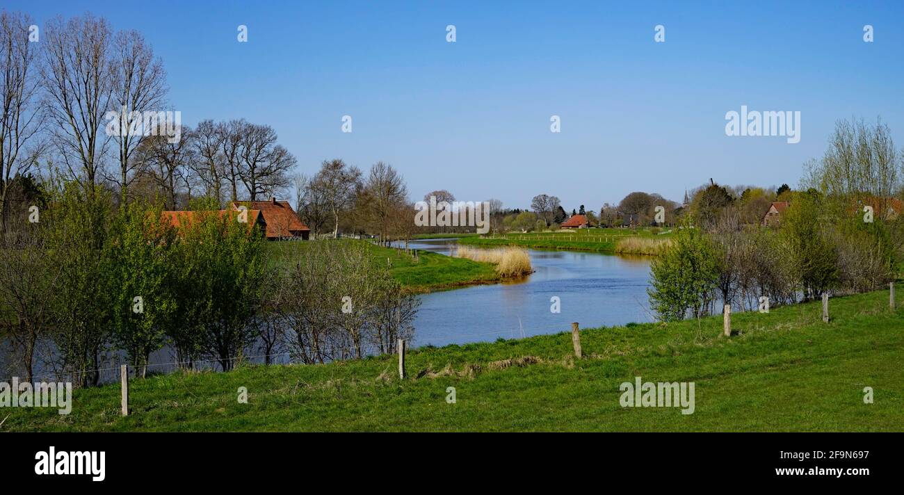 A river meanders trough the farmland in this rural environment in ...