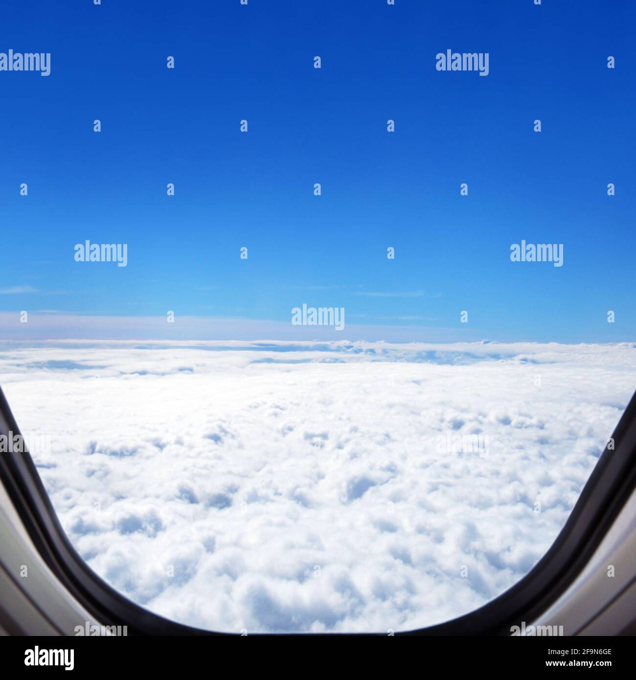 Cloudscape & horizon - aerial view clouds & sky from window of the ...
