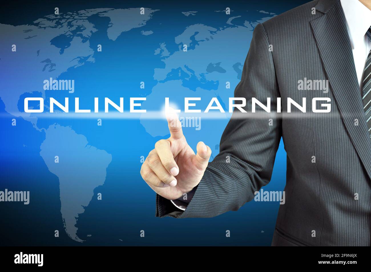 Hand touching ONLINE LEARNING sign on virtual screen Stock Photo - Alamy