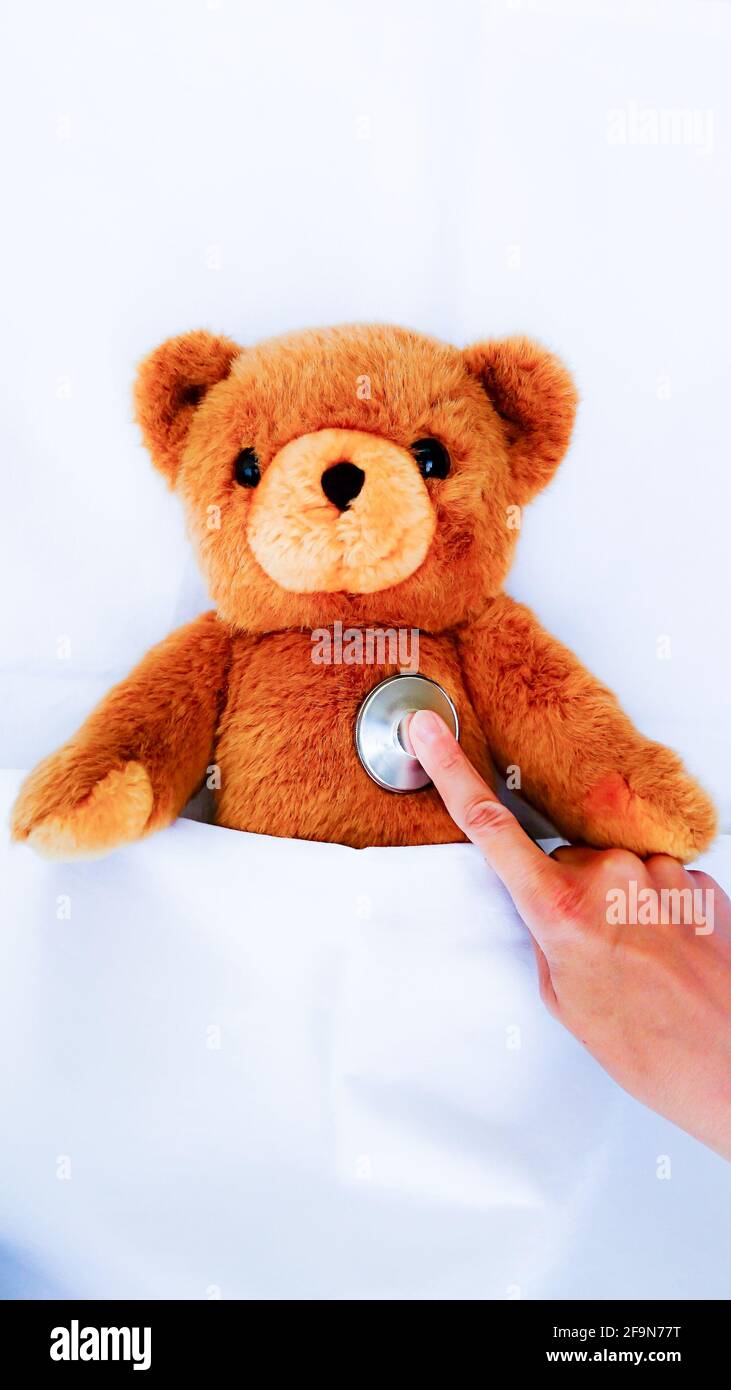 sick soft toy with stethoscope Stock Photo - Alamy