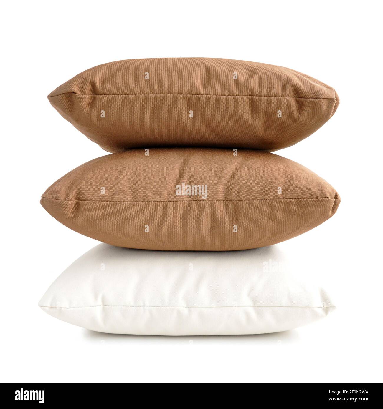 Pillows - stack of three cushions on white background Stock Photo - Alamy