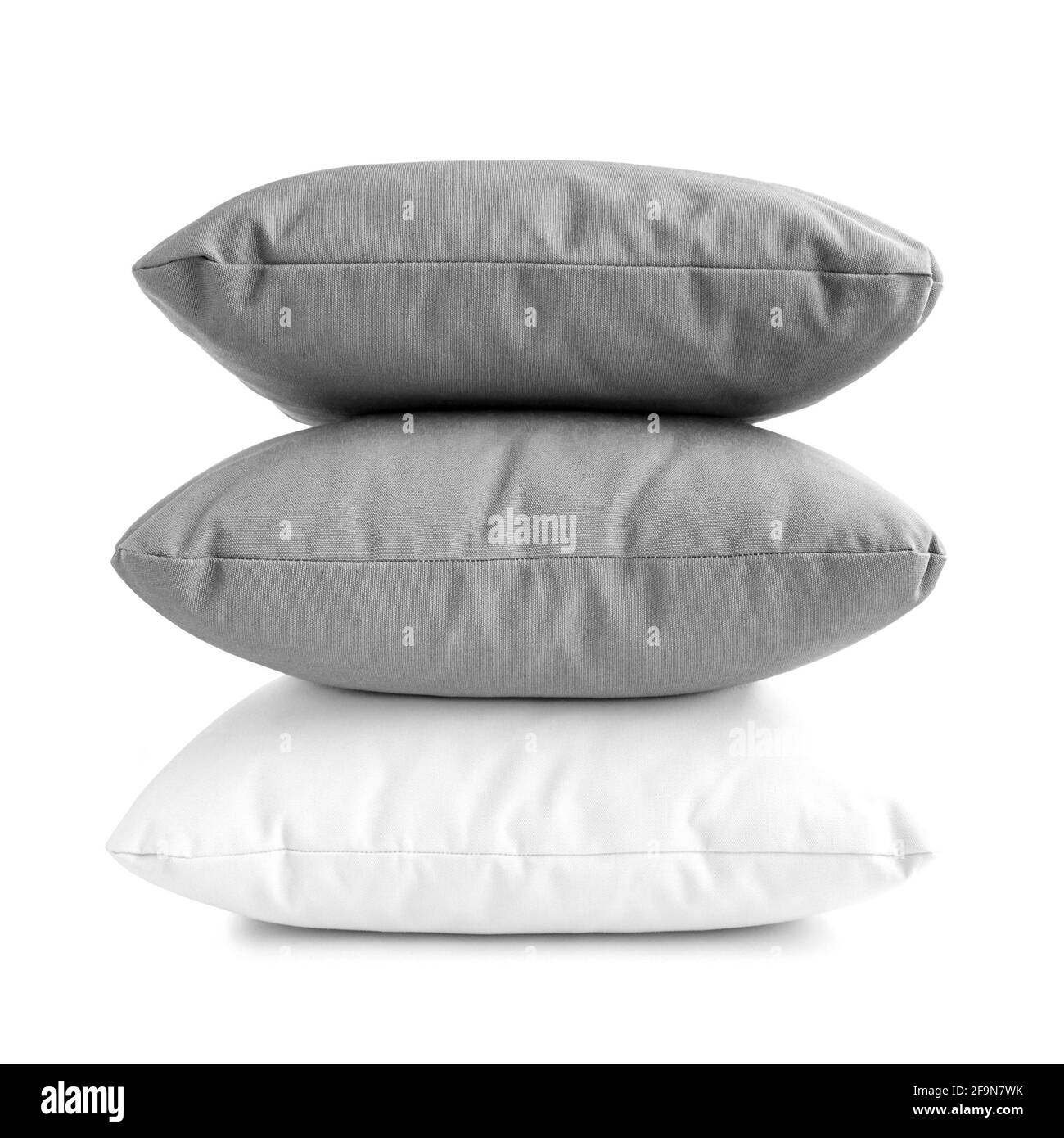 Pillows - stack of three cushions on white background Stock Photo - Alamy