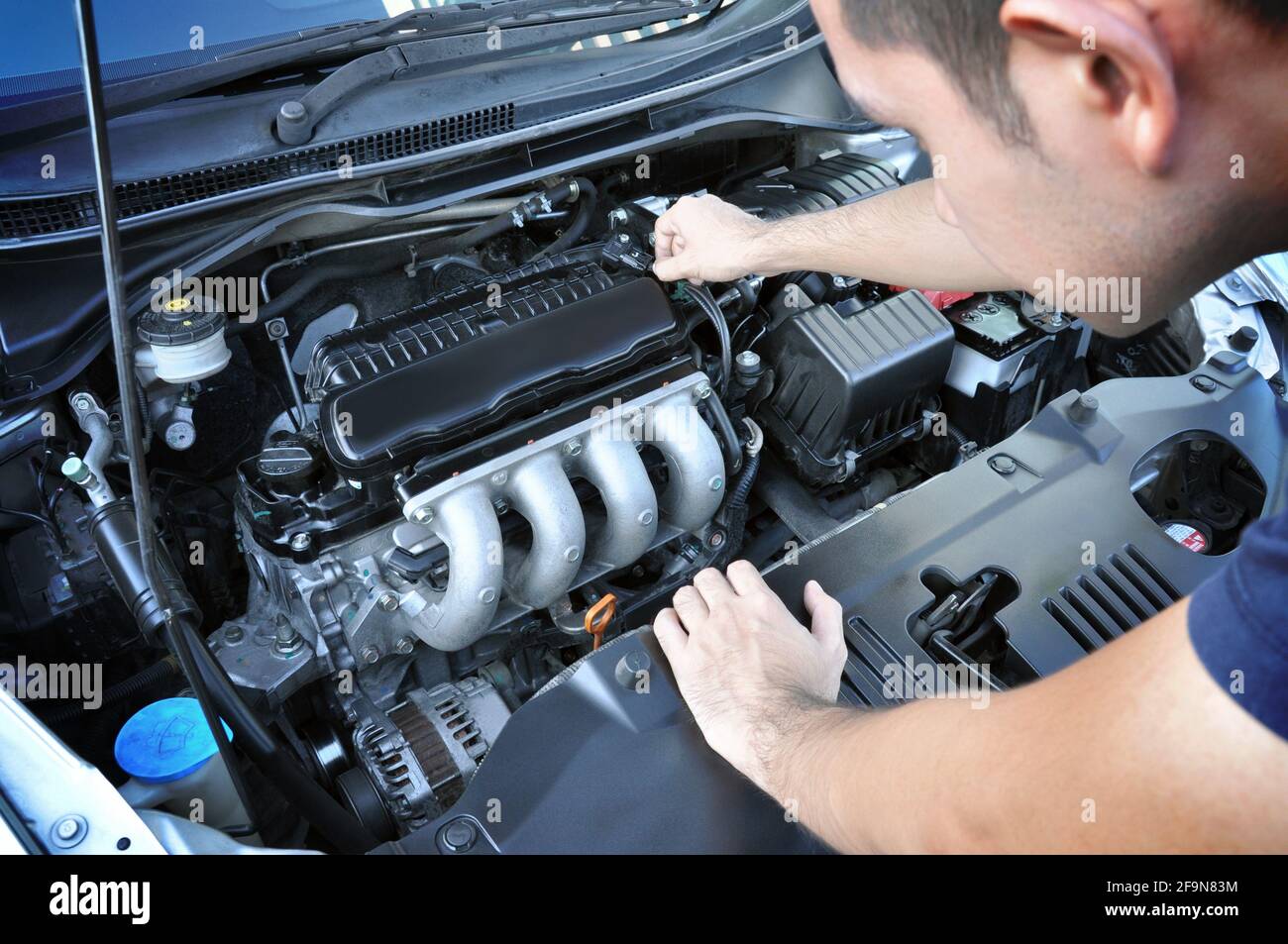A man checking car engine Stock Photo - Alamy