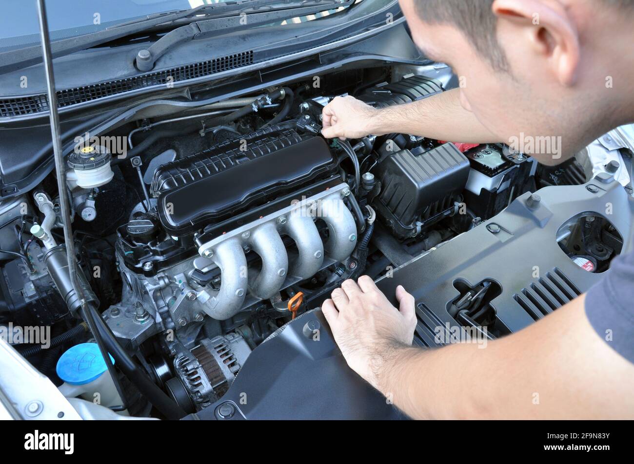 A man checking car engine Stock Photo - Alamy