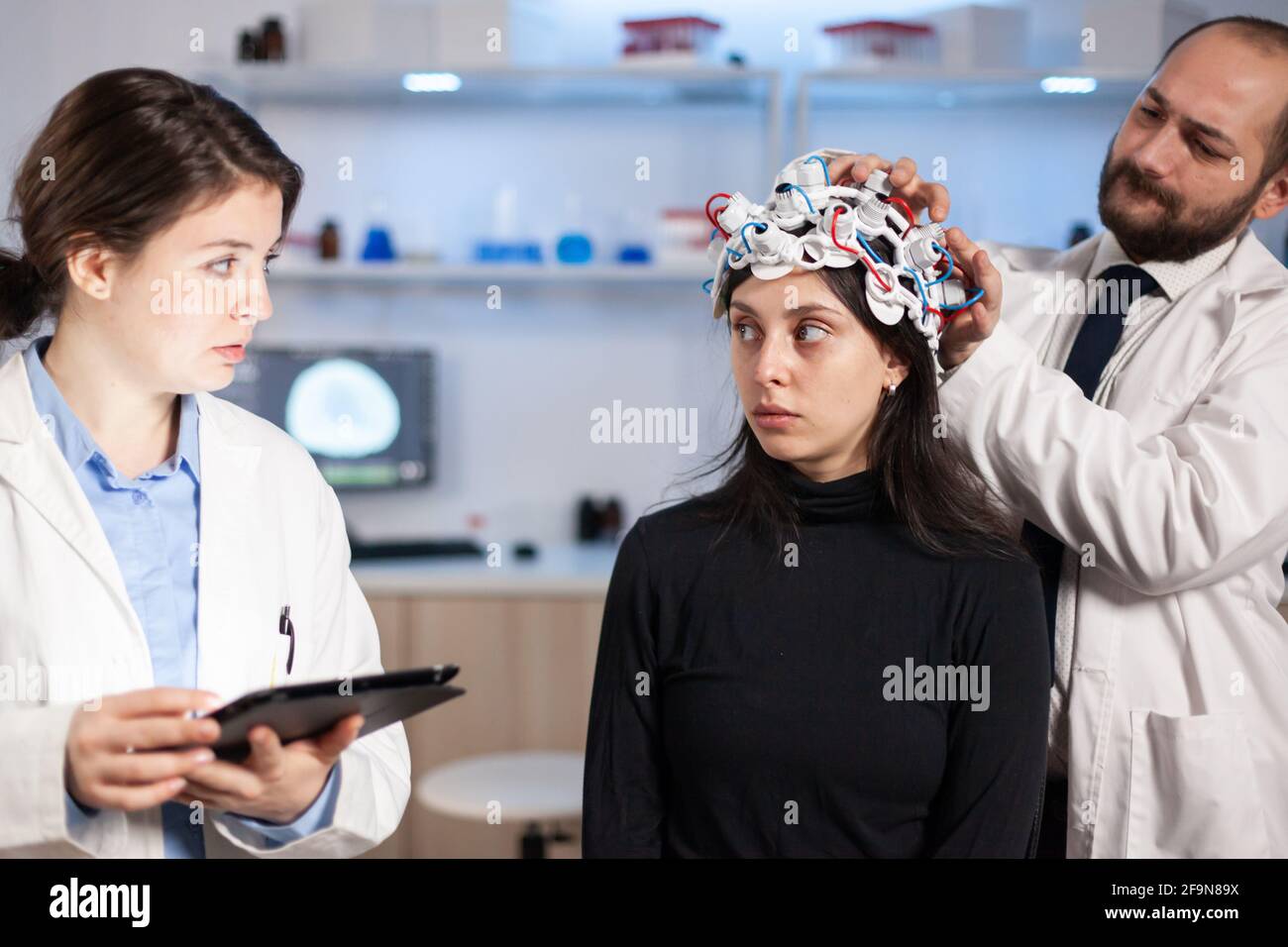 Professional neurological researcher explaning treatment result ...