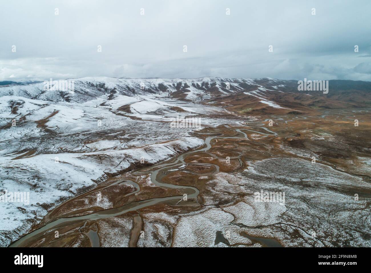Aerial photography of the natural scenery of the wetland after the snow ...