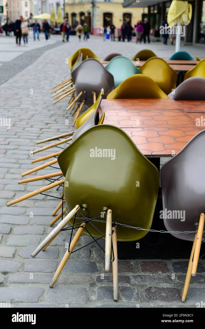 Stacked patio chairs hi-res stock photography and images - Alamy