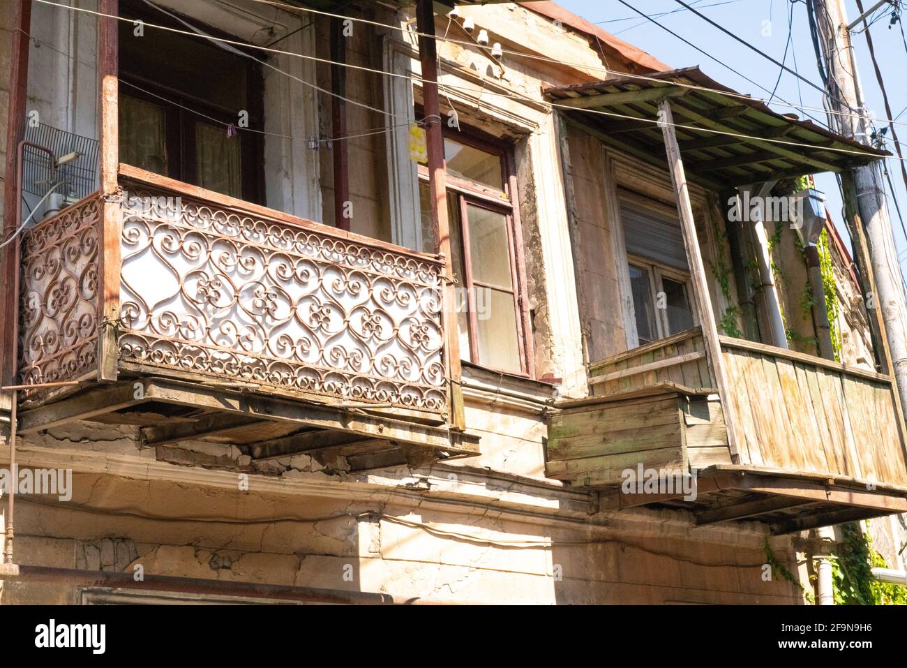 Carved wooden old balcony Stock Photo - Alamy