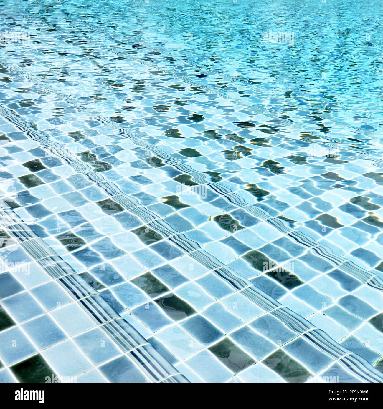 Swimming pool stairs under water Stock Photo - Alamy