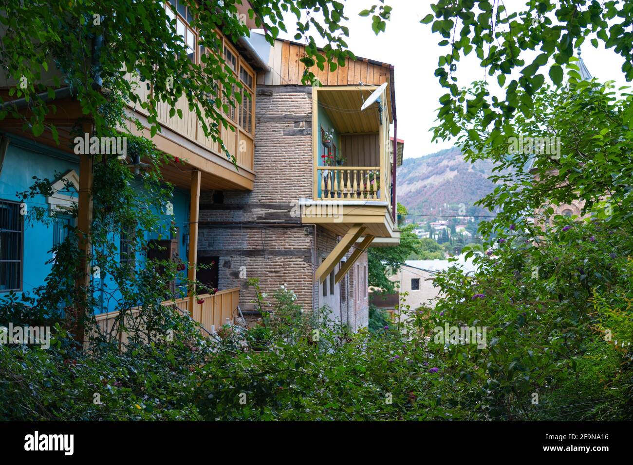 Wooden patterned balcony view from the street Stock Photo - Alamy