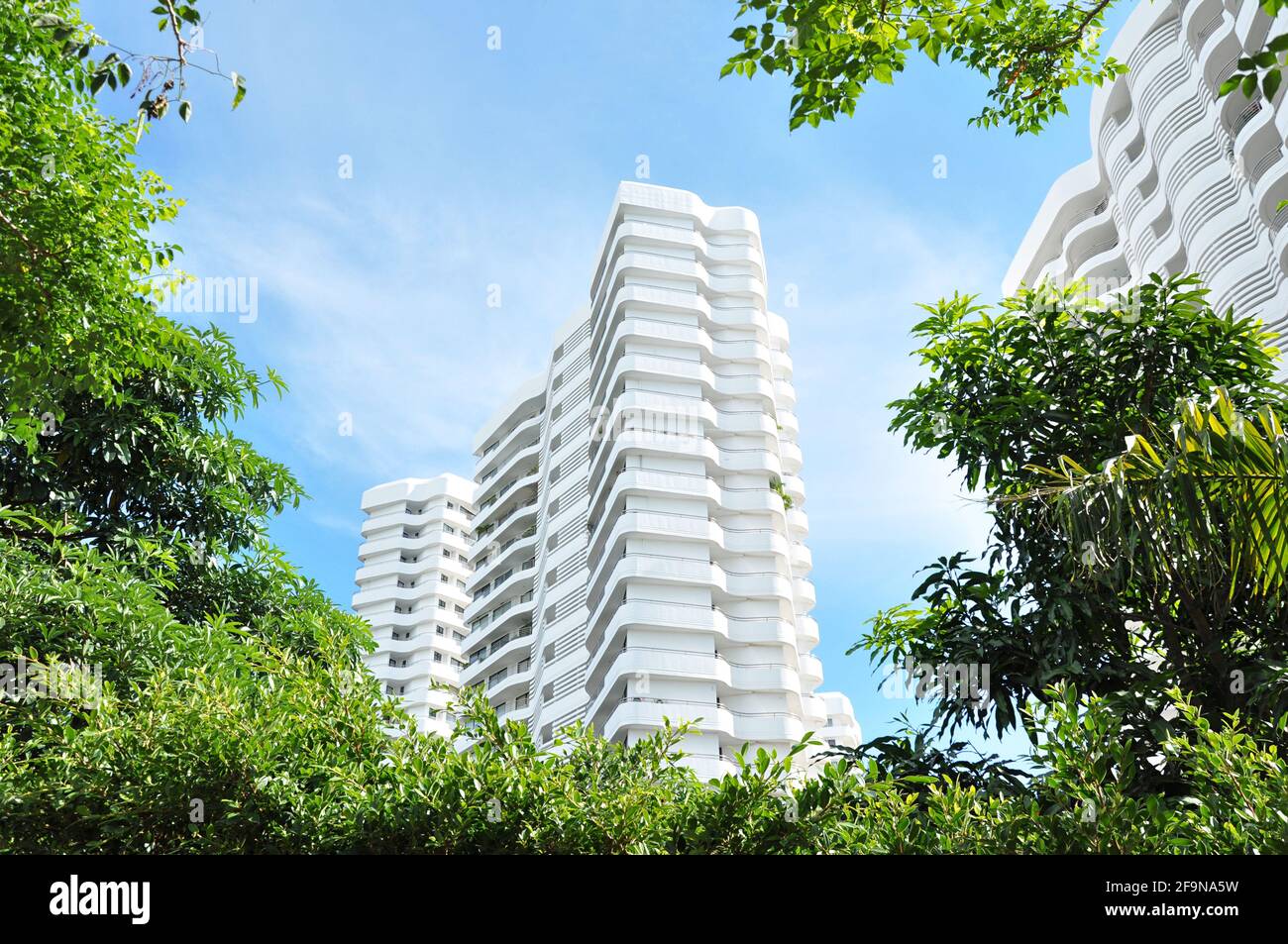 Building surrounded with green plants Stock Photo - Alamy