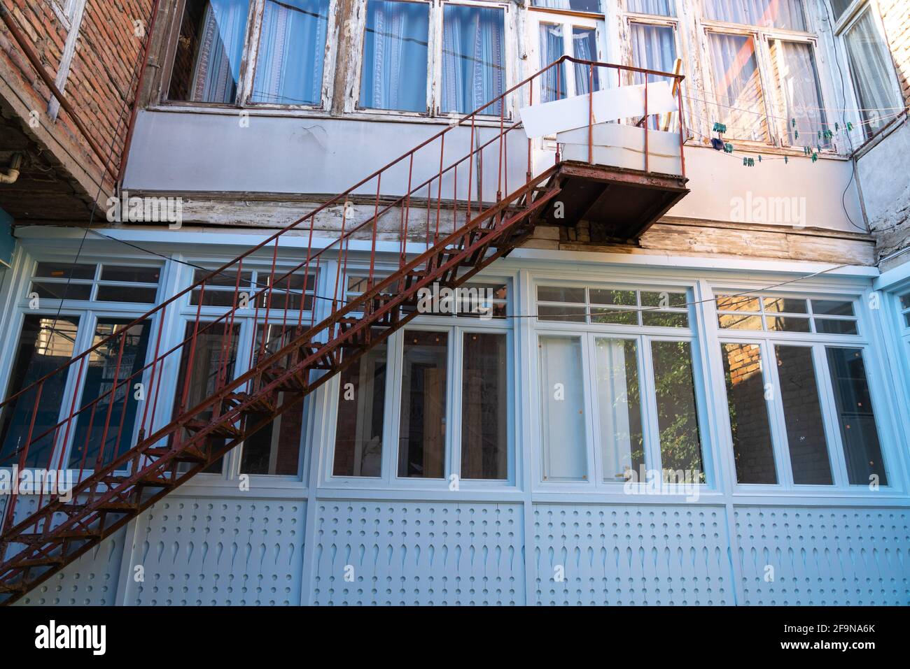 Wooden patterned balcony view from the street Stock Photo - Alamy