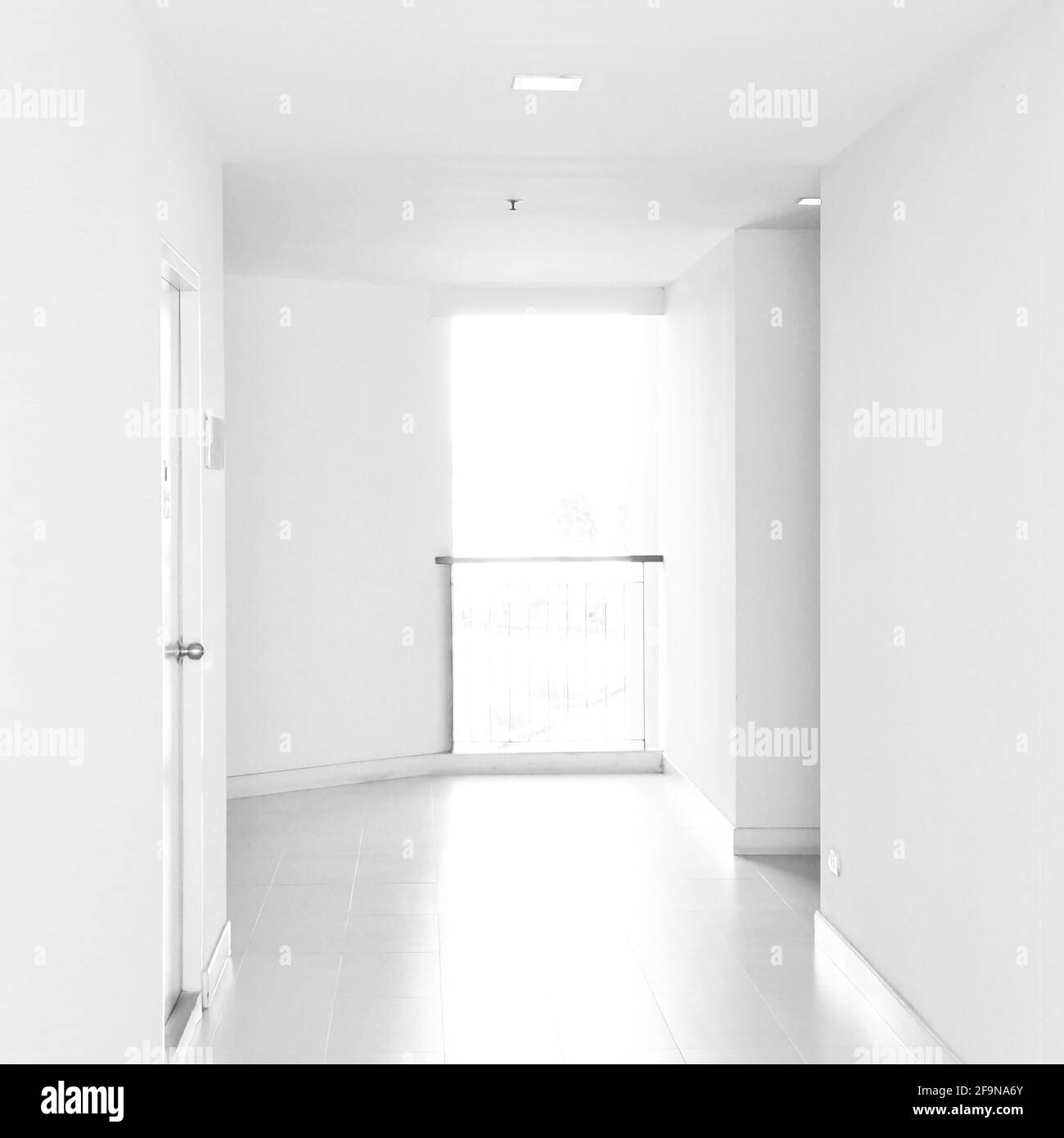 Empty white room white floor Black and White Stock Photos & Images - Alamy