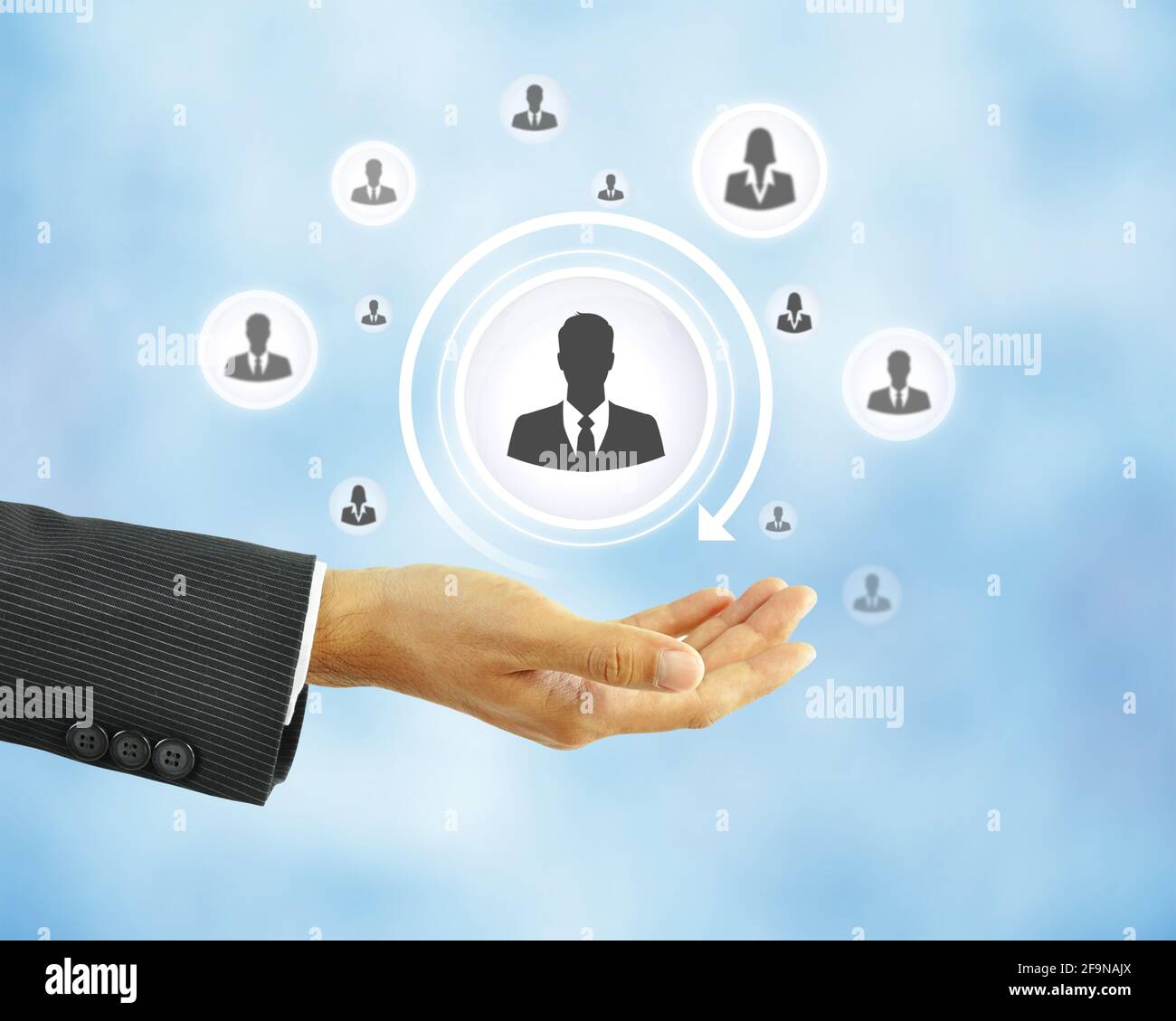 Hand holding businessman icon - business abstract - HR concept Stock ...