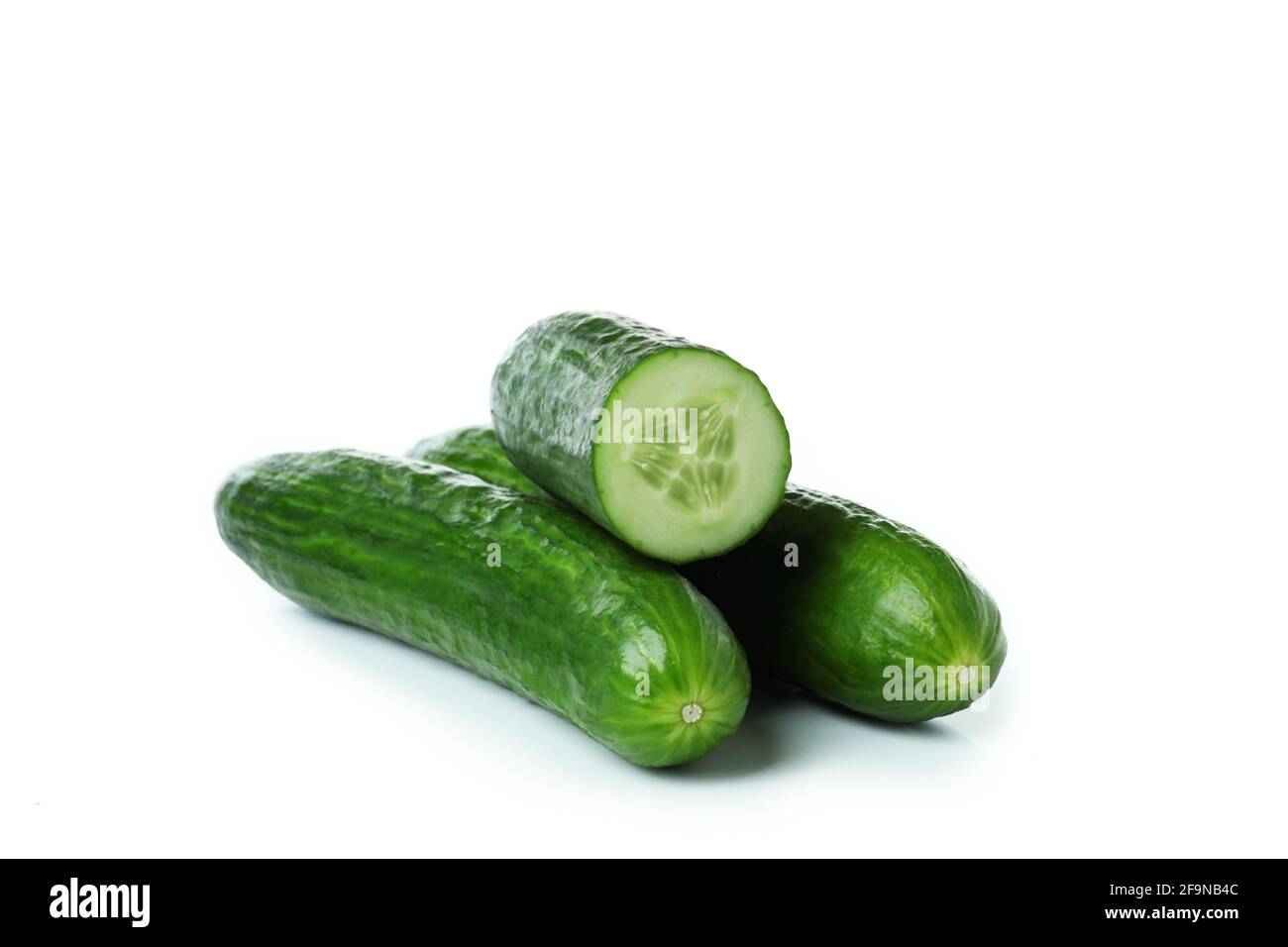 Group of cucumbers isolated on white background Stock Photo - Alamy