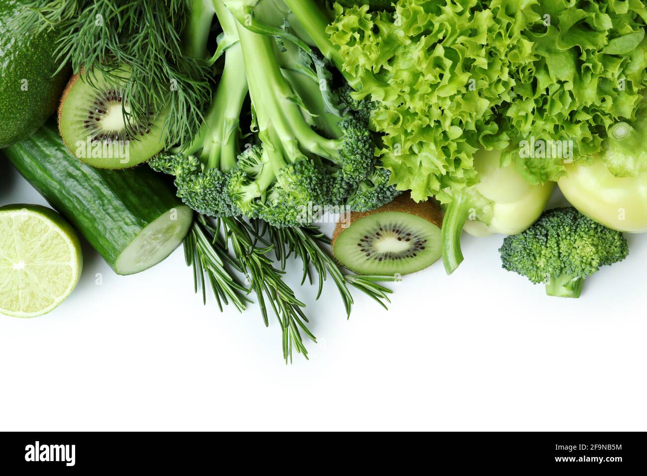 Fresh green vegetables isolated on white background Stock Photo - Alamy