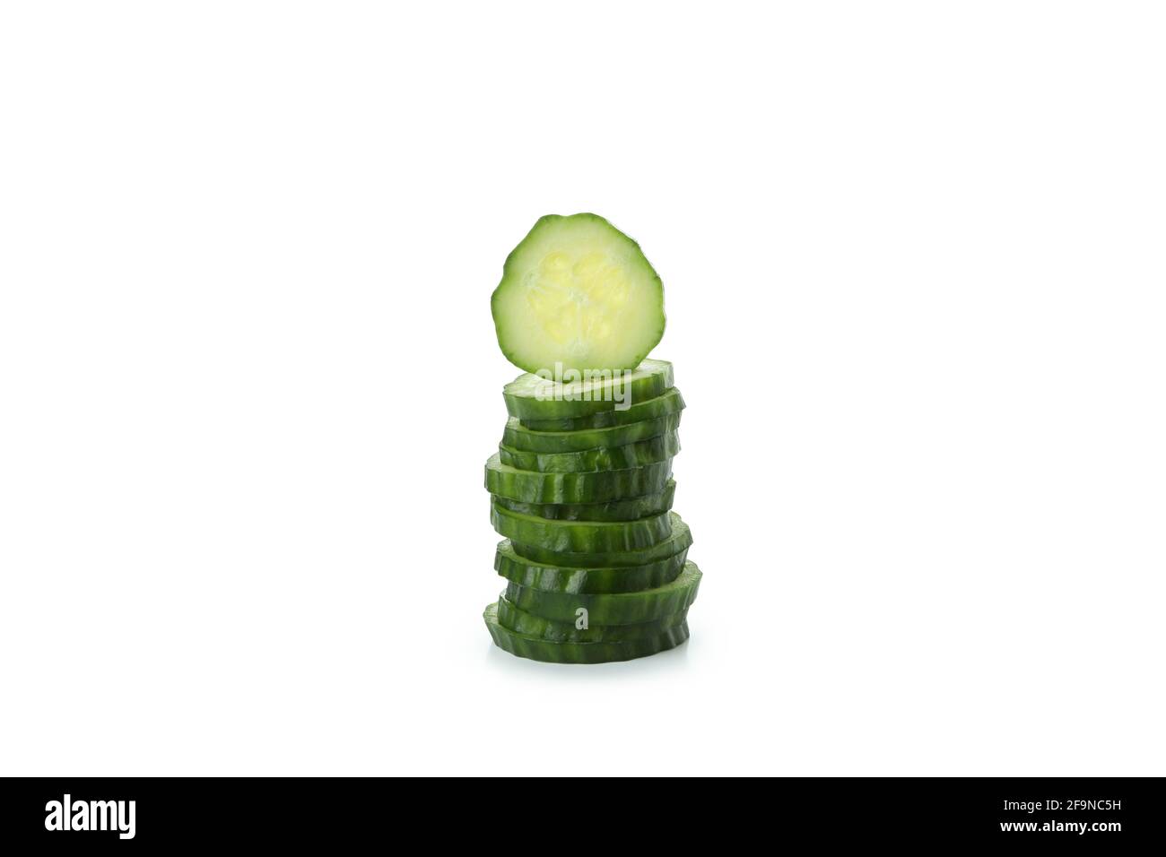 Fresh sliced cucumber isolated on white background Stock Photo - Alamy