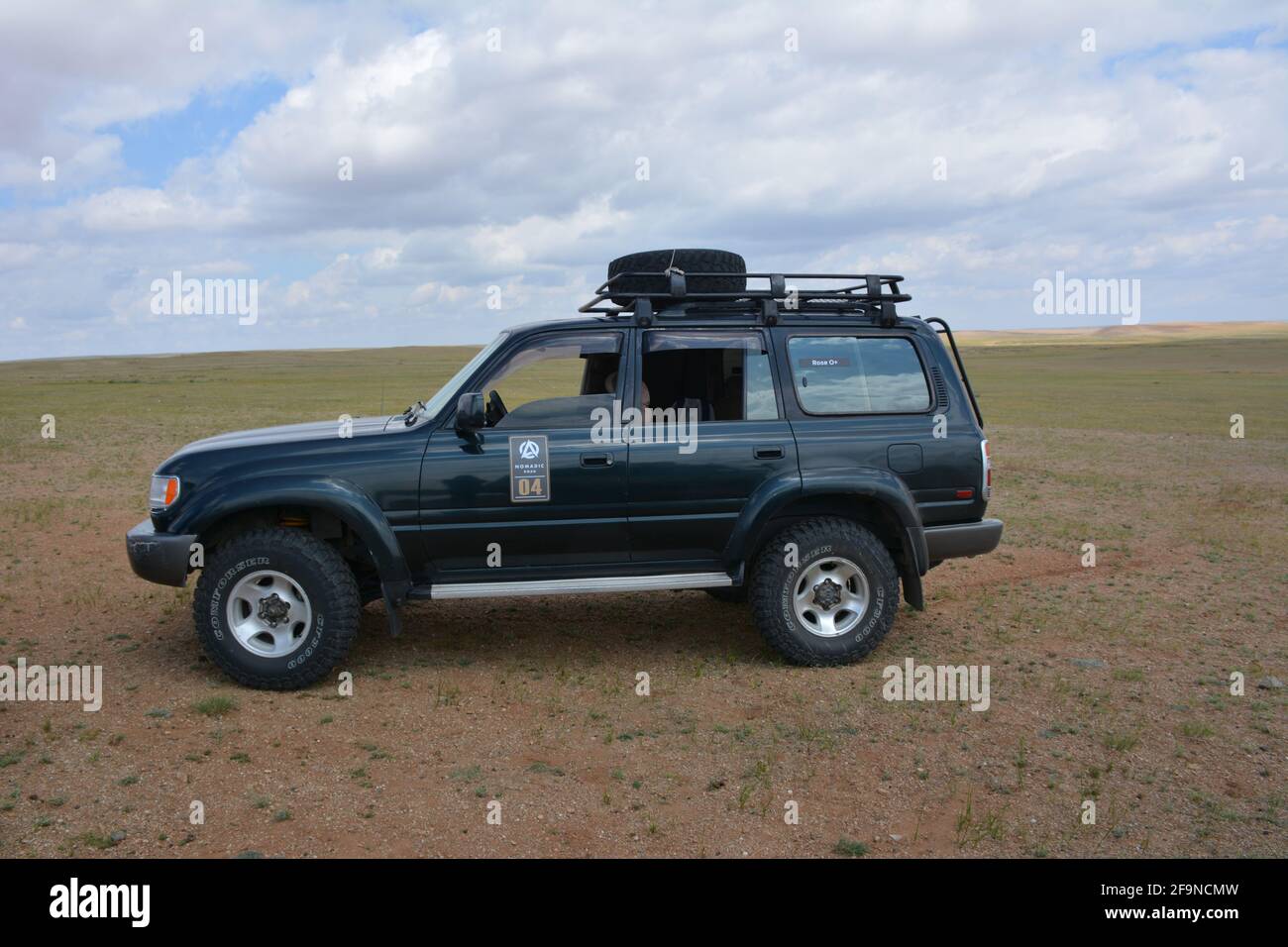 A Lexus 450 on an off-road trip through Mongolia. The car was almost ...