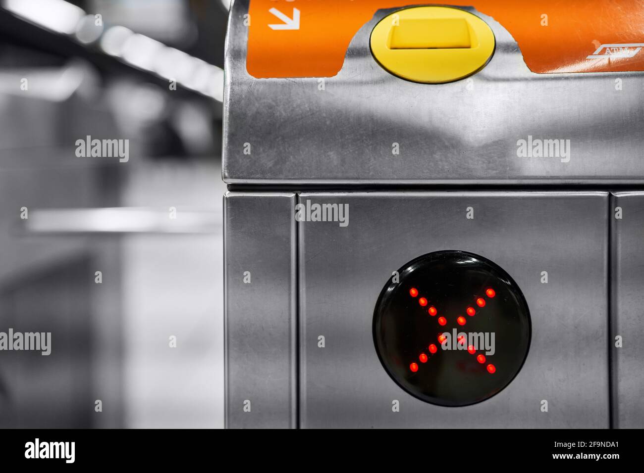 Closeup of electronic turnstile at subway station platform. Gates are ...