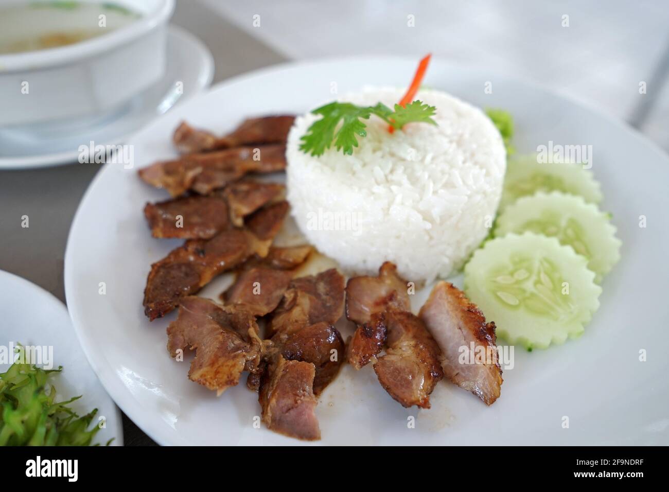Asian glazed pork belly rice hi-res stock photography and images - Alamy
