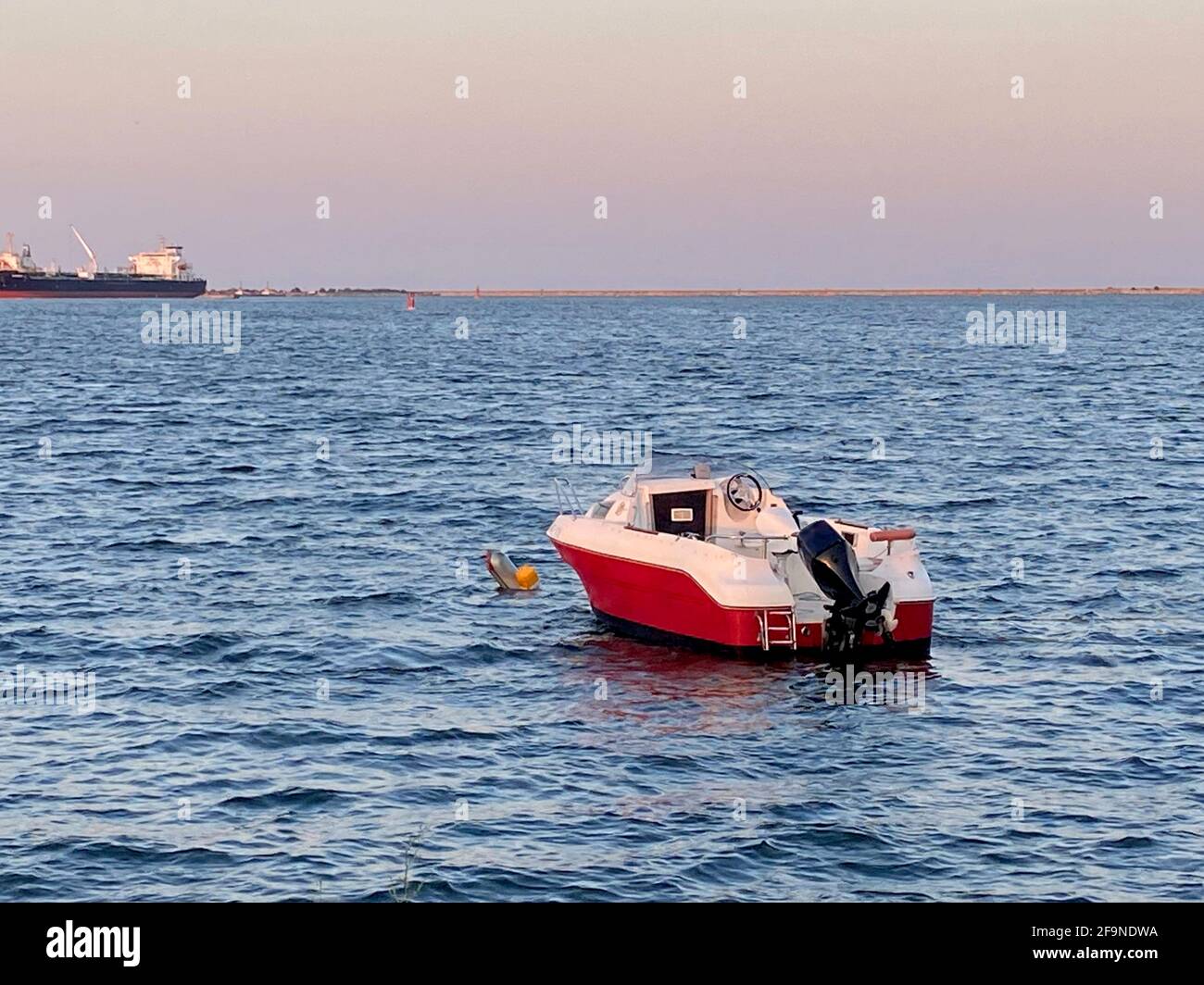 Small boat on sea hi-res stock photography and images - Alamy