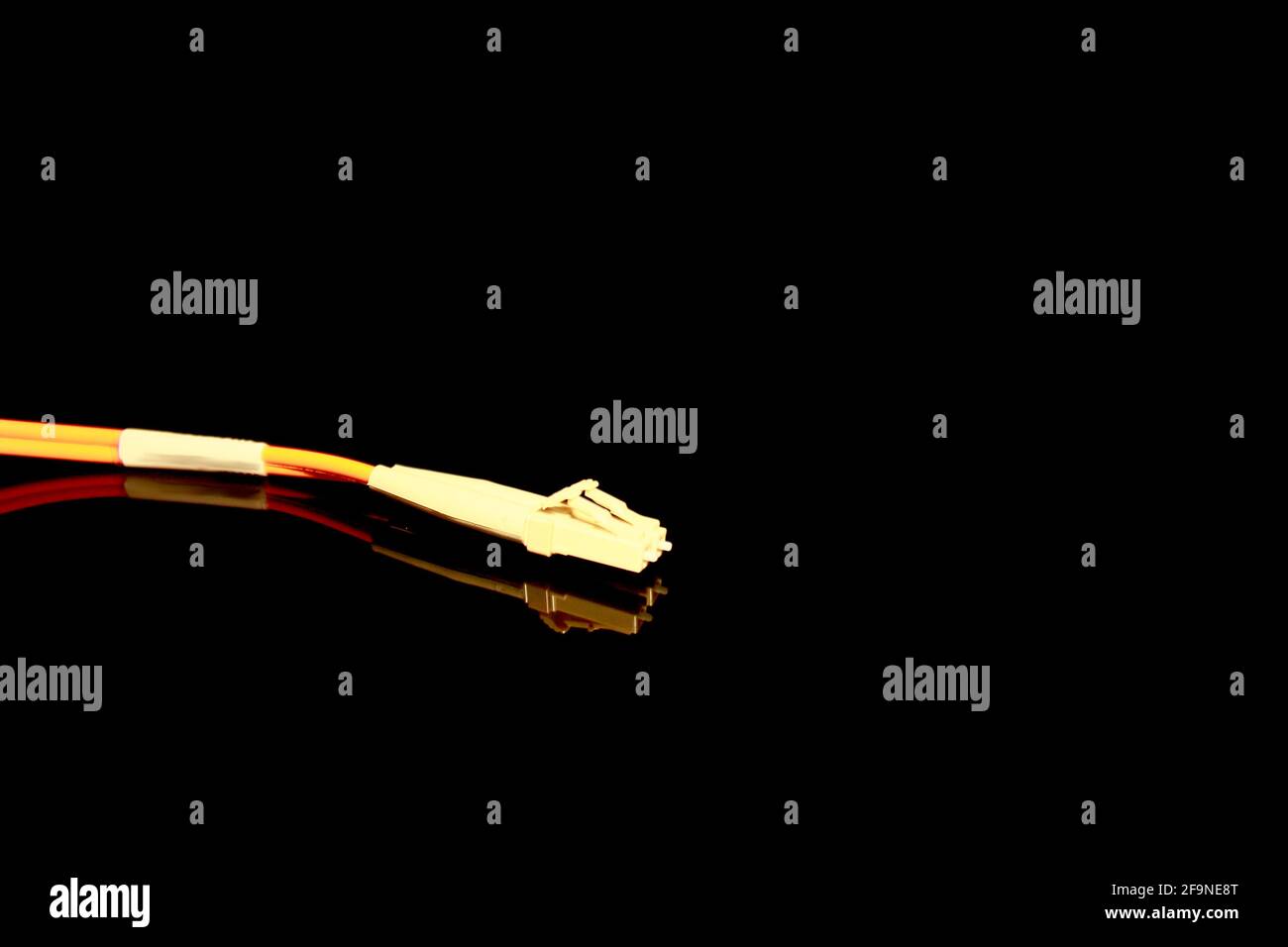 Twin optical fiber connectors isolated on black with reflections Stock ...