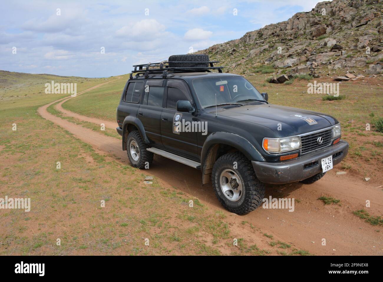 A Lexus 450 on an off-road trip through Mongolia. The car was almost ...