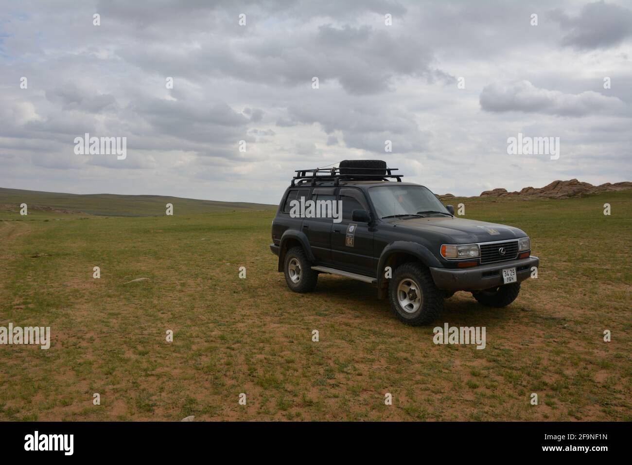 A Lexus 450 on an off-road trip through Mongolia. The car was almost ...