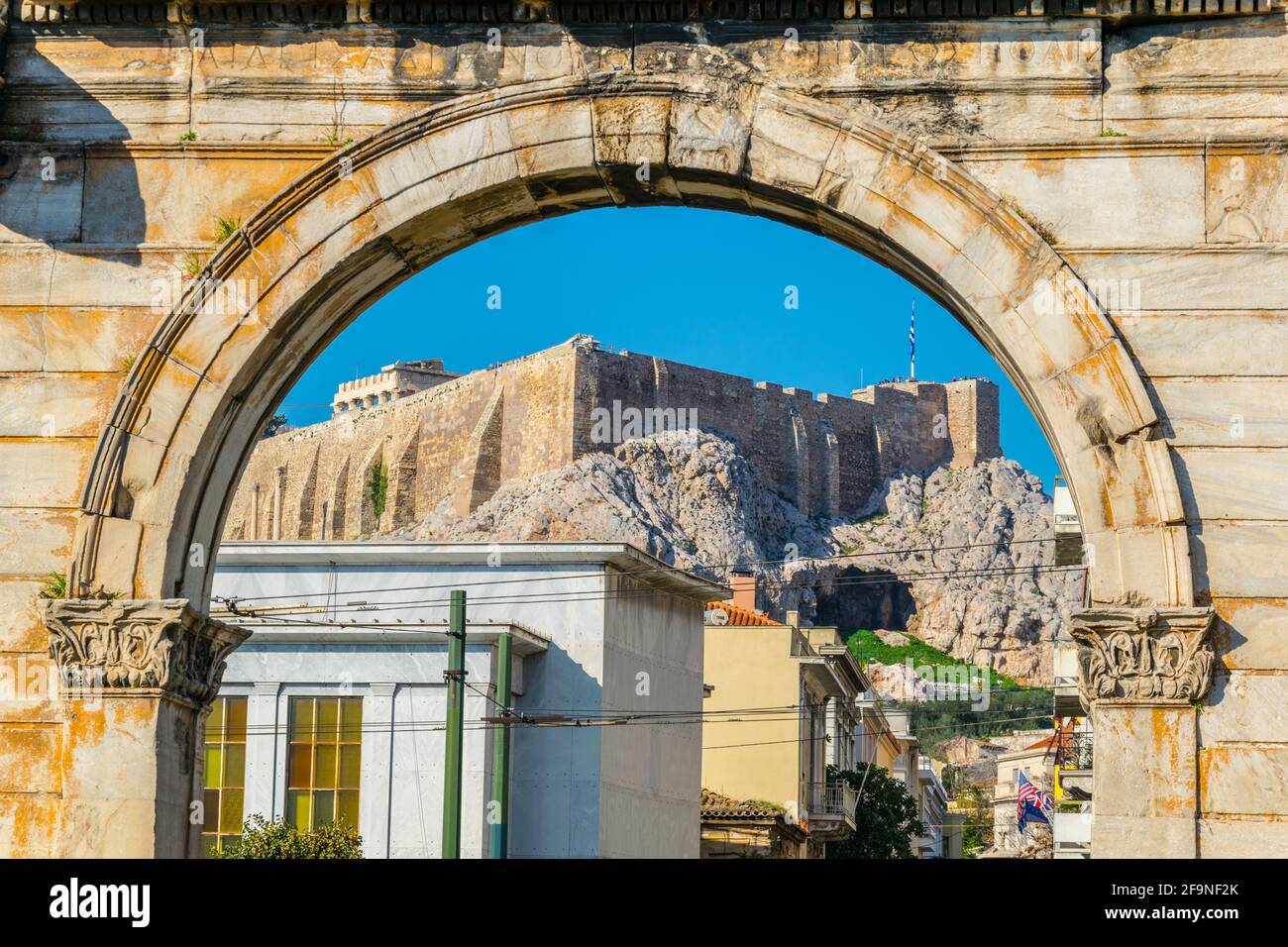 Acropolis viewed through hadrian arch in athens Stock Photo - Alamy