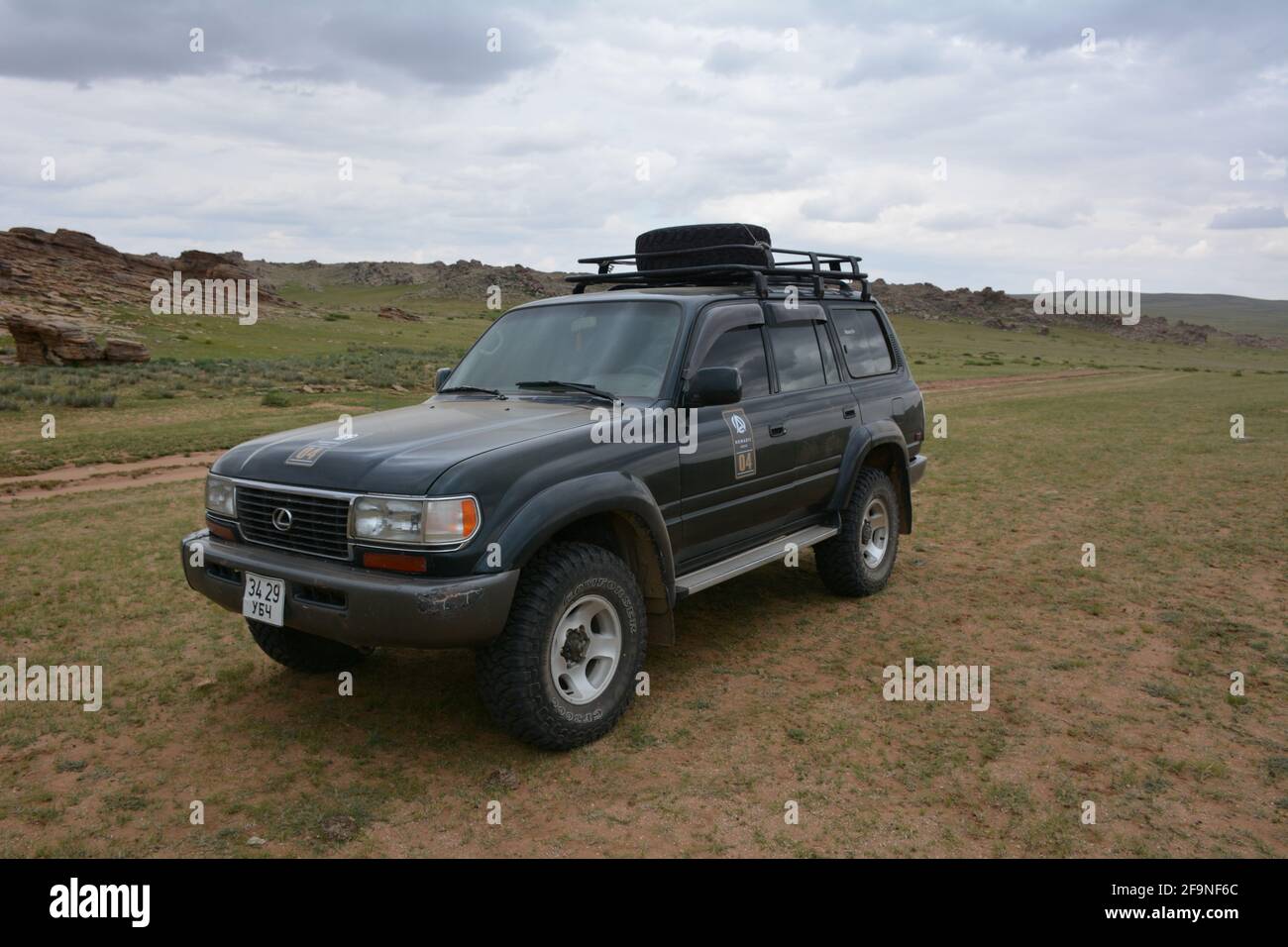A Lexus 450 on an off-road trip through Mongolia. The car was almost ...