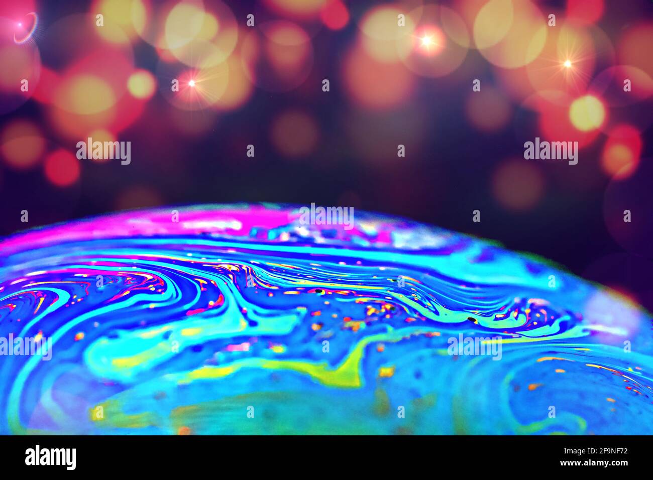 A colorful soap bubble in a macro photography perspective in the ...