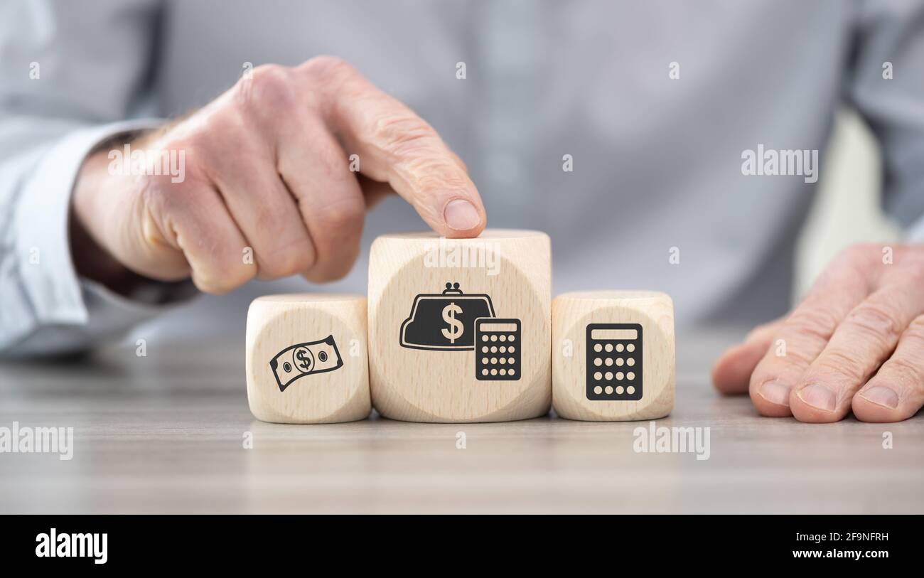 Wooden blocks with symbol of money management concept Stock Photo - Alamy