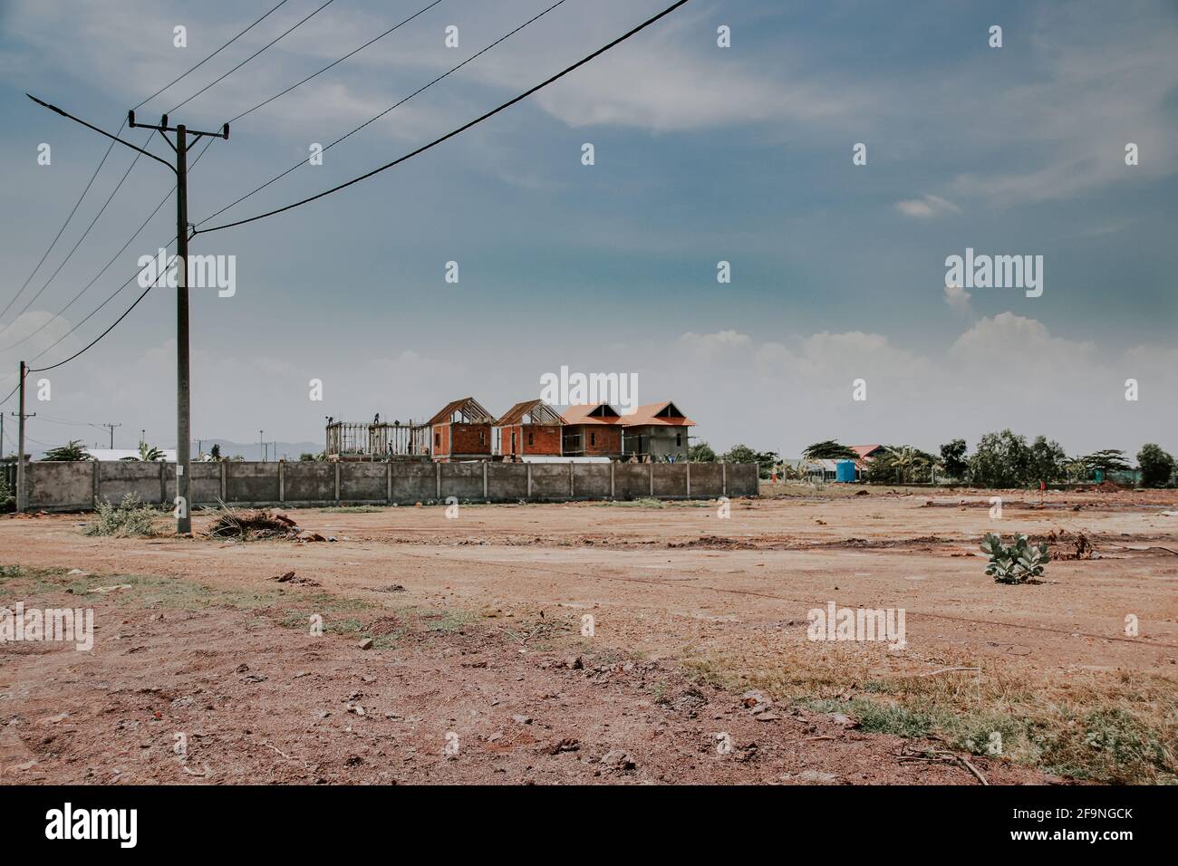 Remote buildings by the side of the countryside road Stock Photo - Alamy