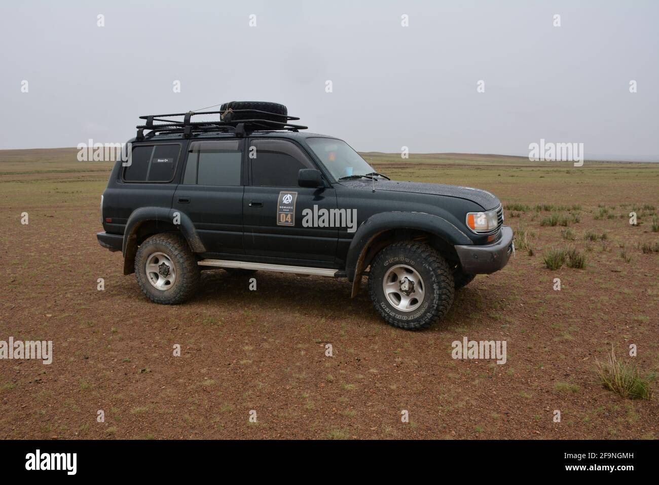 A Lexus 450 on an off-road trip through Mongolia. The car was almost ...