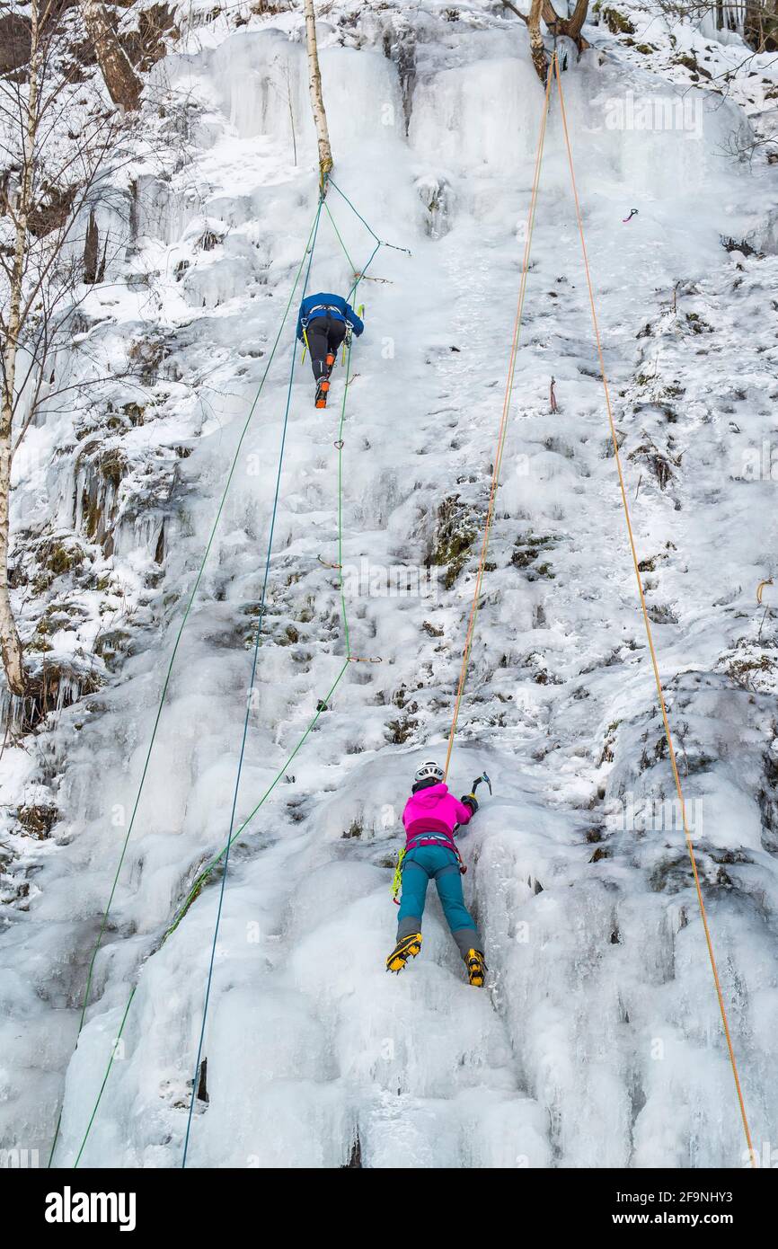 Climbing on frozen ice in Gluszca, Poland Stock Photo - Alamy