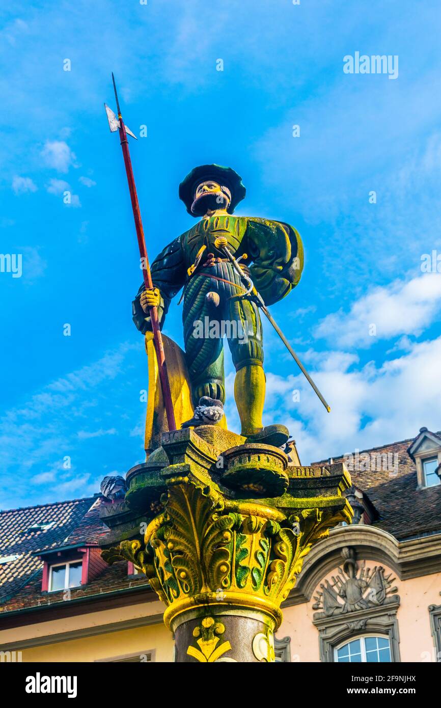 Statue of a swiss guard situated on the top of a fountain on the ...