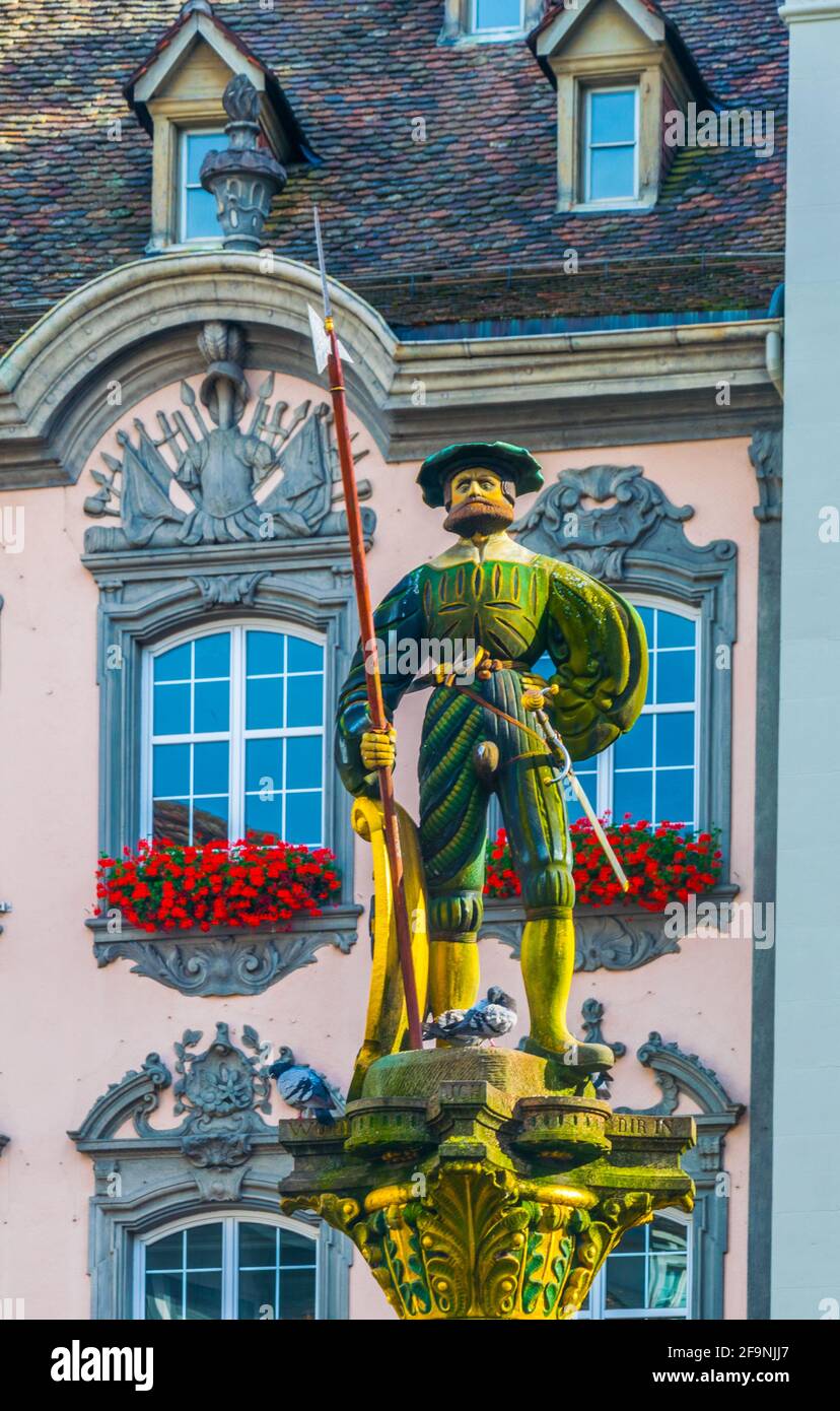 Statue of a swiss guard situated on the top of a fountain on the ...