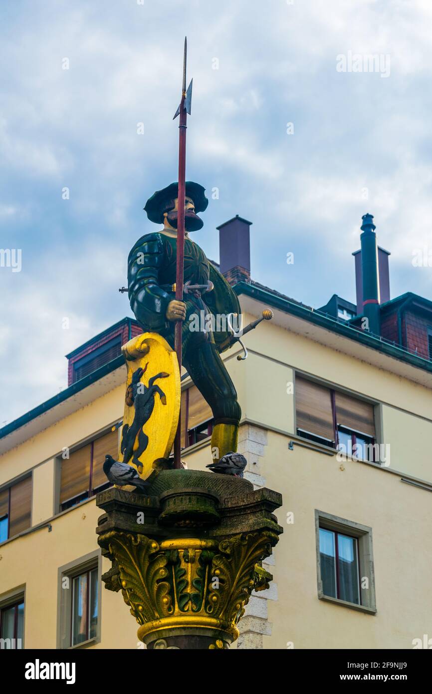 Statue of a swiss guard situated on the top of a fountain on the ...
