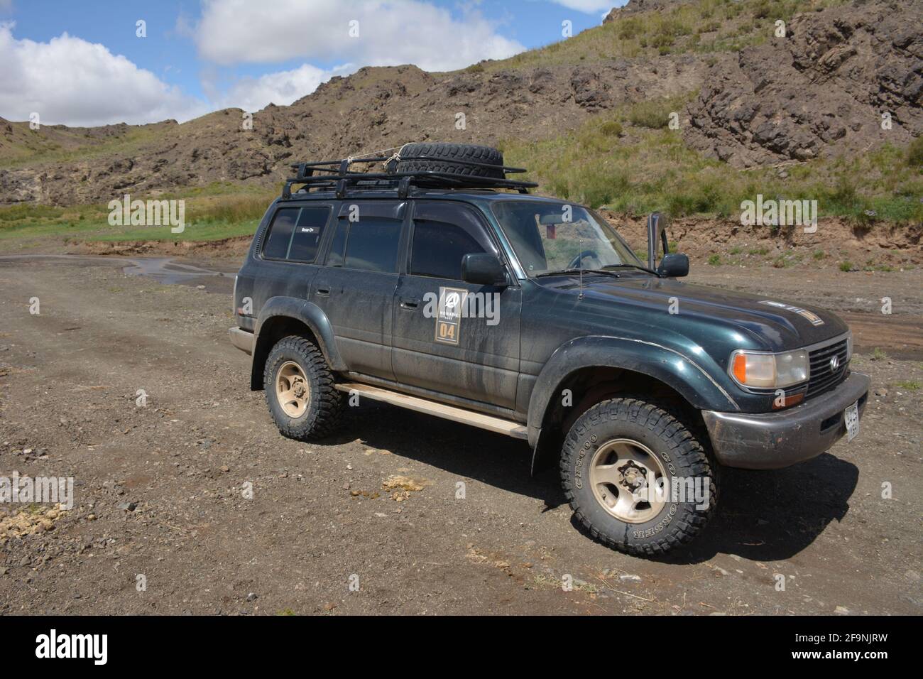 A Lexus 450 on an off-road trip through Mongolia. The car was almost ...