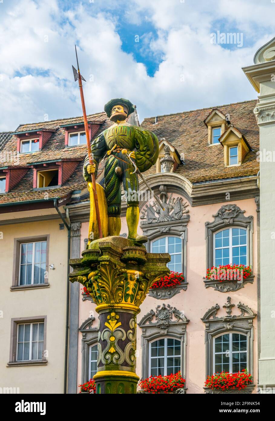 Statue of a swiss guard situated on the top of a fountain on the ...