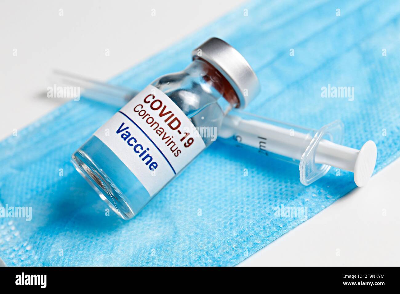 Macro shot of antiviral vaccine vial for immunization against covid-19 ...
