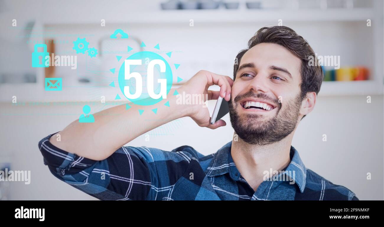 Composition of 5g text over digital icons and smiling man talking on ...